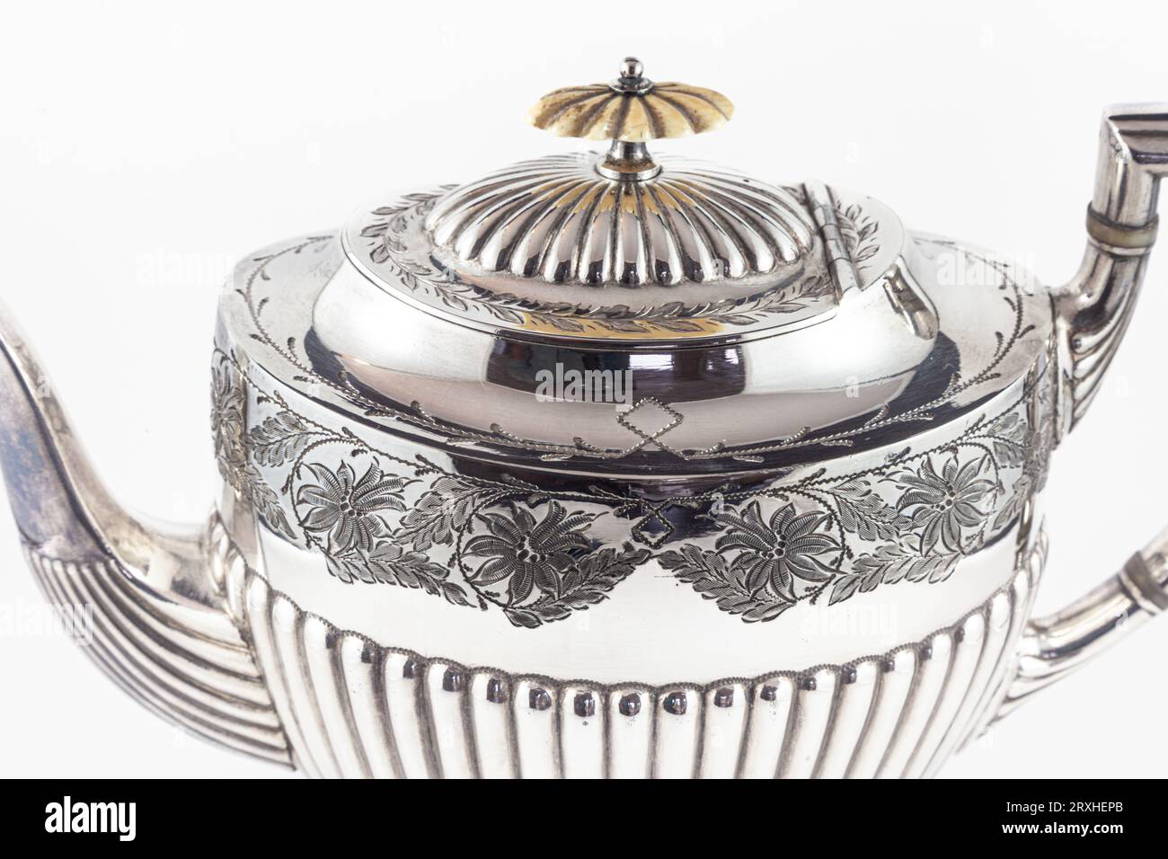 Detailed engraving on an antique tea pot circa 1870 Stock Photo - Alamy