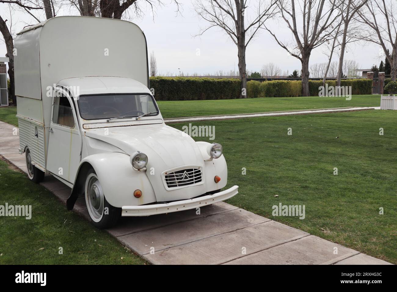 Nice Classic Citroen 2cv gray van on a garden Stock Photo - Alamy