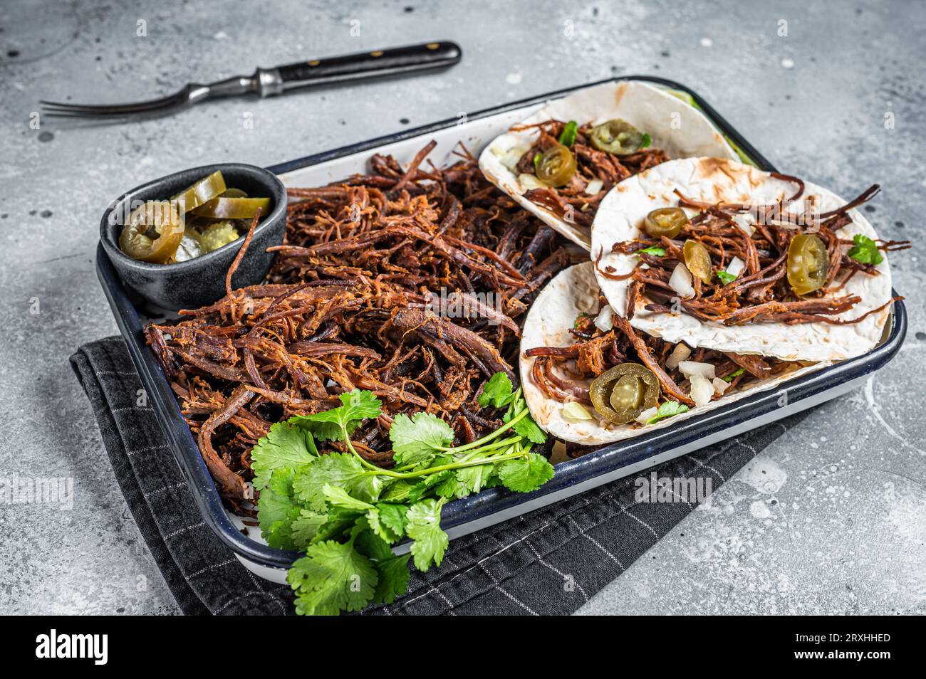 Cooking of Mexican lamb Barbacoa Tacos with Cilantro and Onion. Gray ...