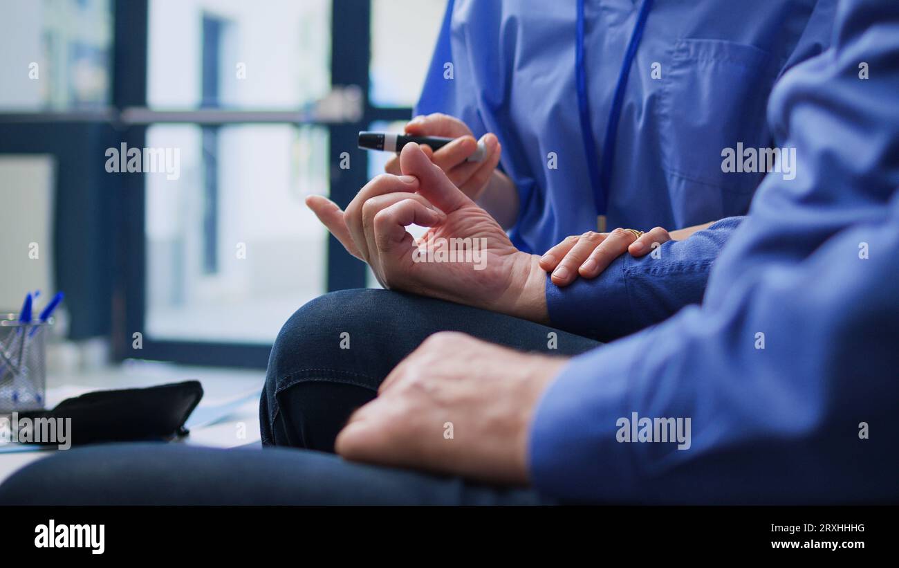 Assistant measuring insulin level and glucose in blood sample using ...