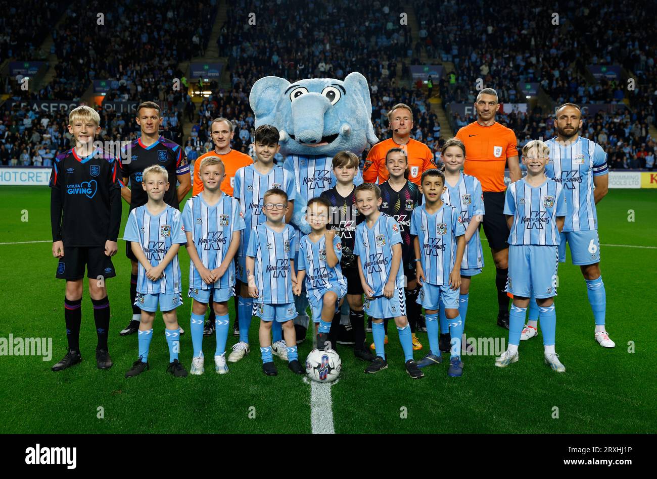 Coventry City mascot Sky Blue Sam poses for a photo with the captains ...