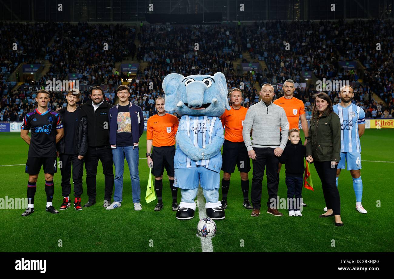 Coventry City mascot Sky Blue Sam poses for a photo with the captains ...