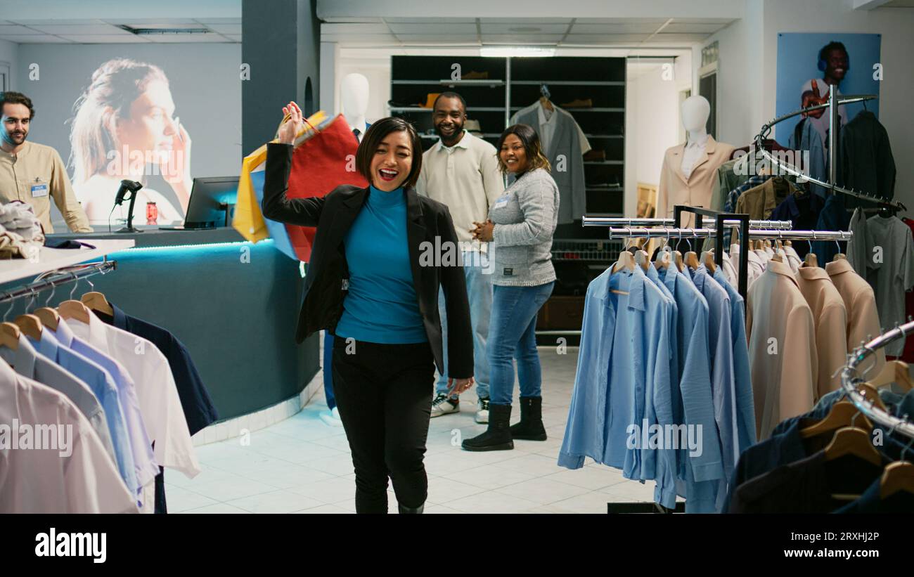 Asian customer doing dance moves hi-res stock photography and images ...