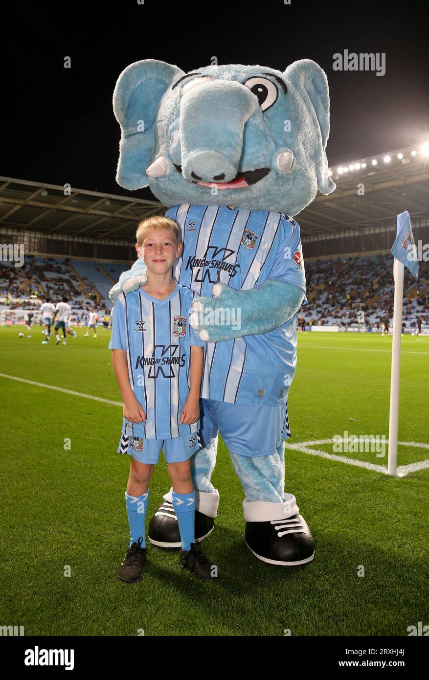 Coventry City mascot Sky Blue Sam poses for a photo with a matchday ...