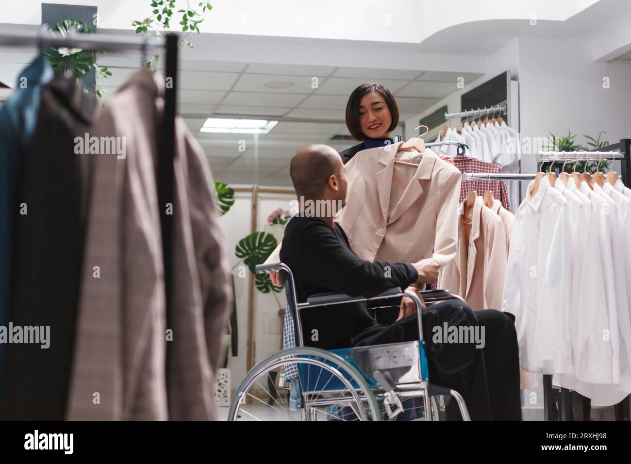 Shopping wheelchair assisting hi-res stock photography and images - Alamy