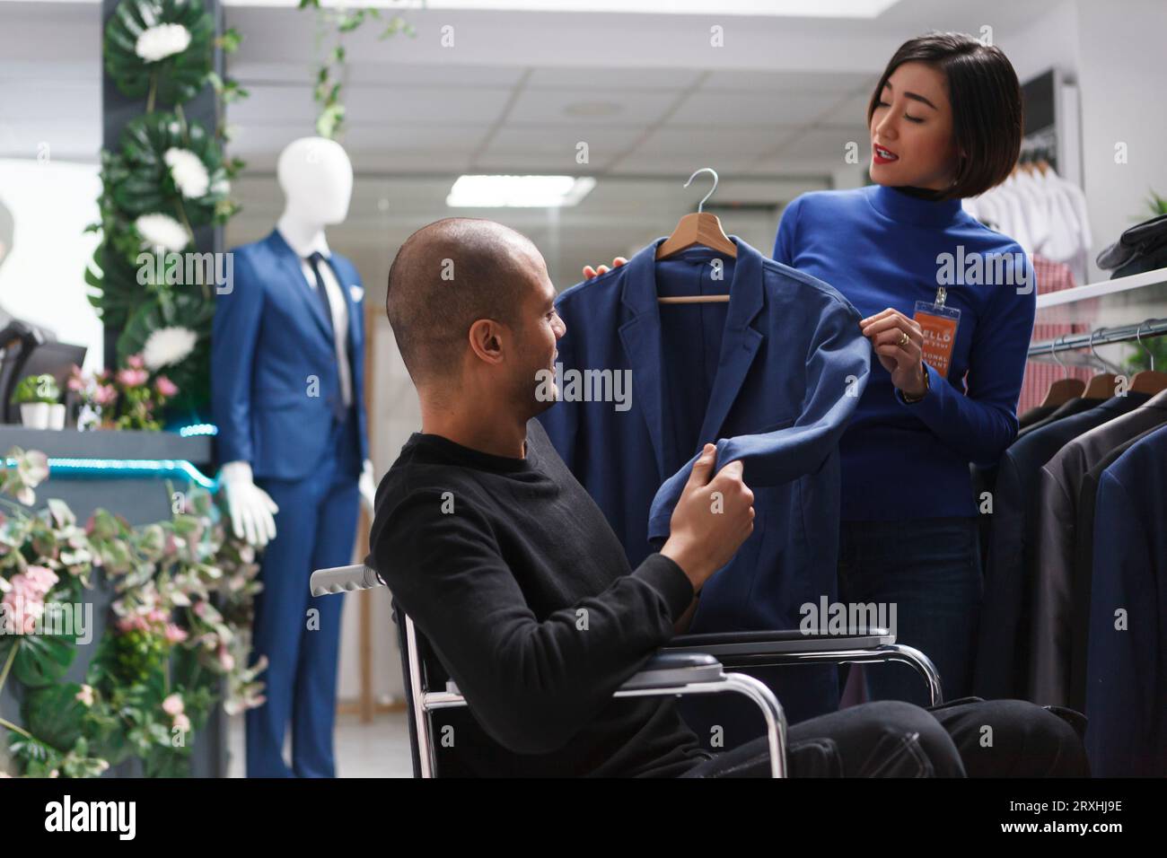 Shopping wheelchair assisting hi-res stock photography and images - Alamy