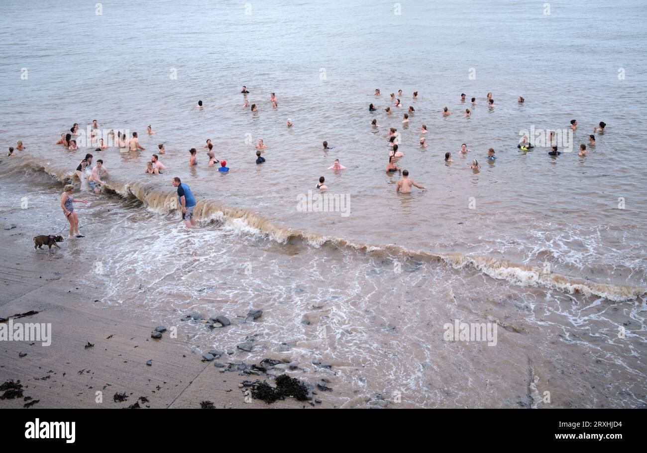 Crowd of swimmers in the sea at Penarth Glamorgan Wales UK Stock Photo ...