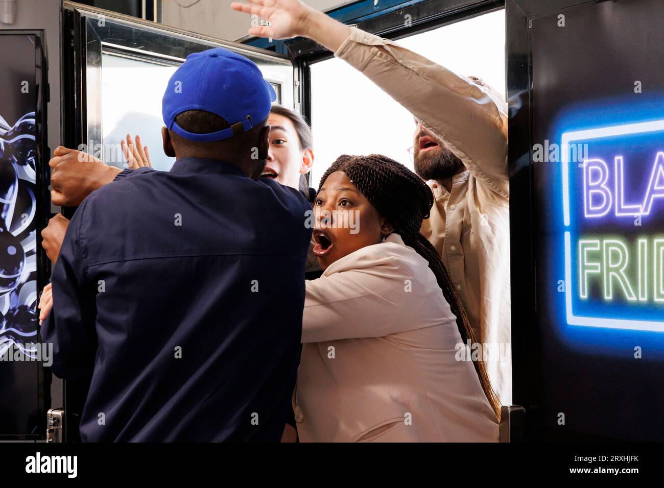 Black friday shoppers pushing hi-res stock photography and images - Alamy