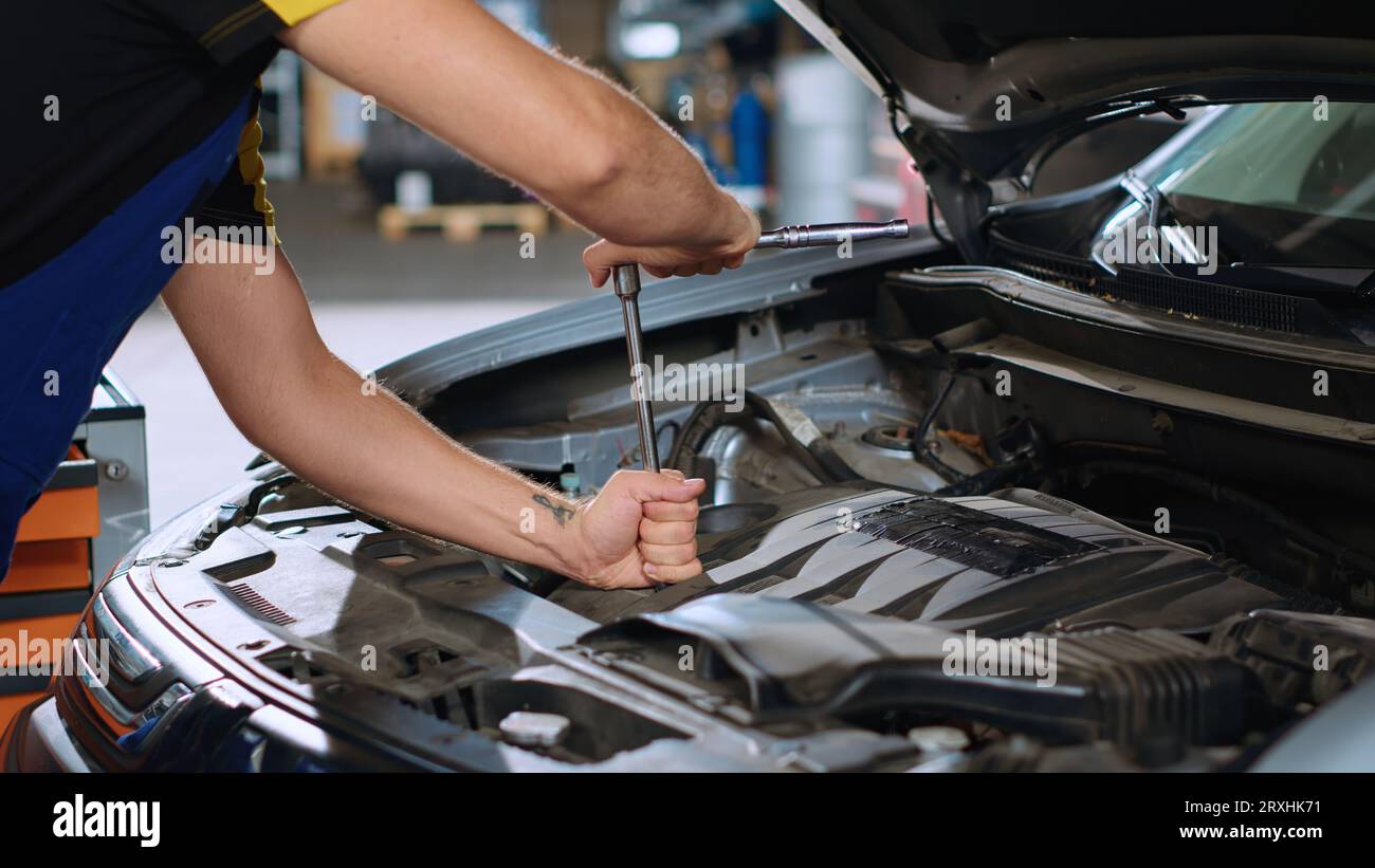 Worker uses torque wrench close hi-res stock photography and images - Alamy