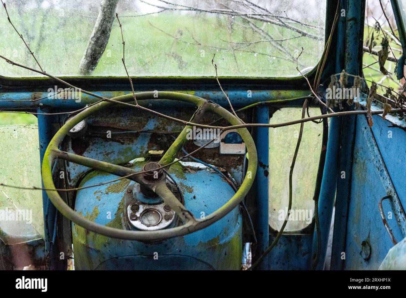 Old ruined blue Ford tractor Stock Photo - Alamy