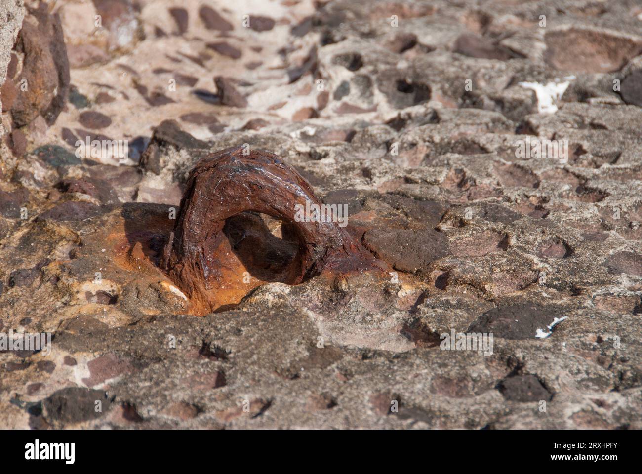 Rusty mooring shackle on sea wall, Shell Harbour, New South Wales south ...