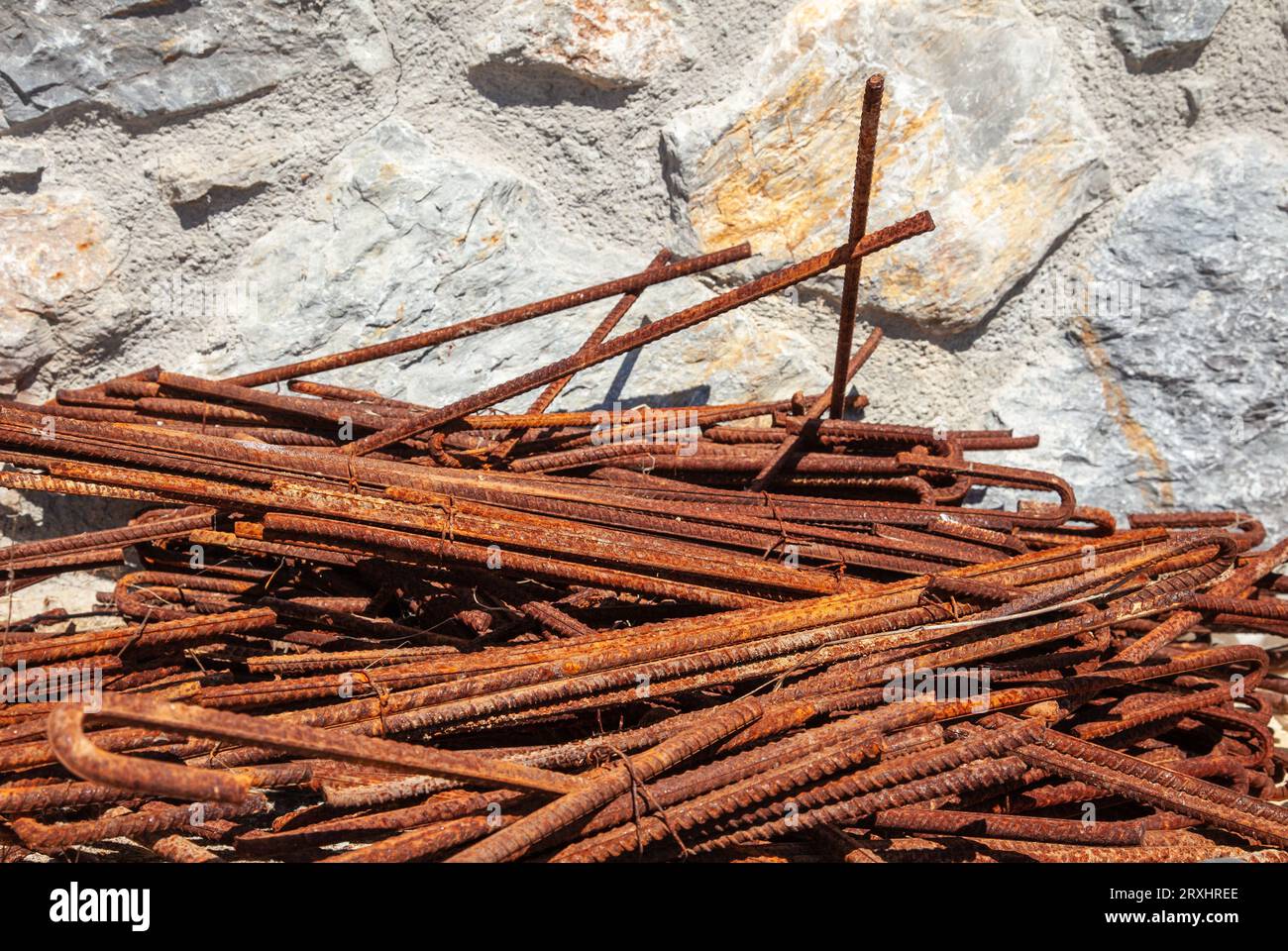 The pile of rusty rebar. Close up. Oxidation of old iron due to have ...