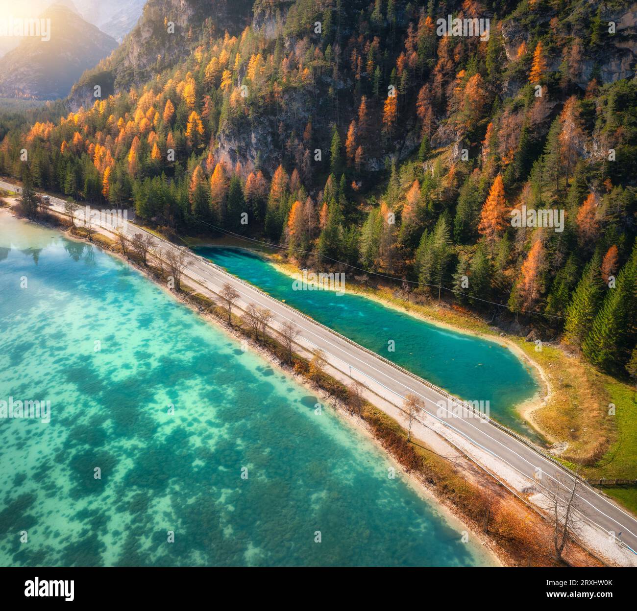 Aerial view of road, azure lakes, forest in mountains in autumn Stock ...