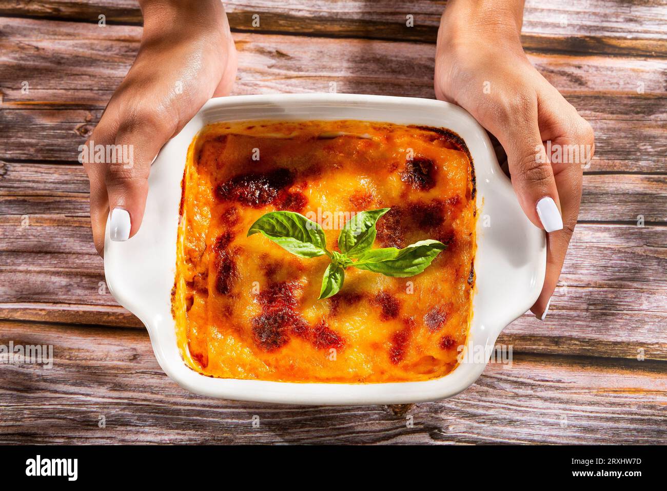 Lasagna hands hi-res stock photography and images - Alamy