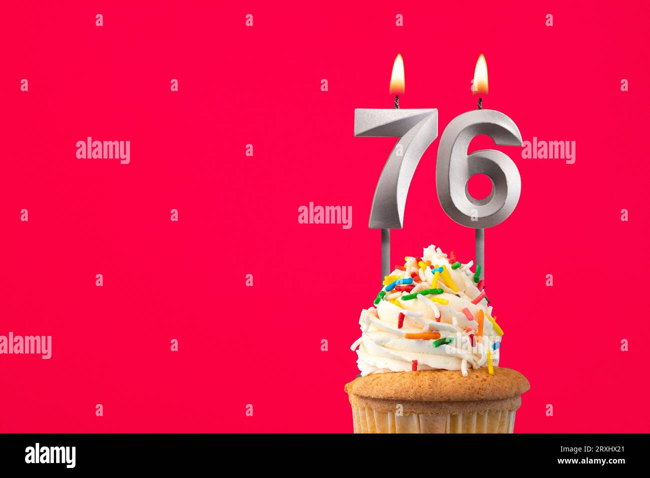 Burning candle number 76 - Birthday card with cake Stock Photo - Alamy