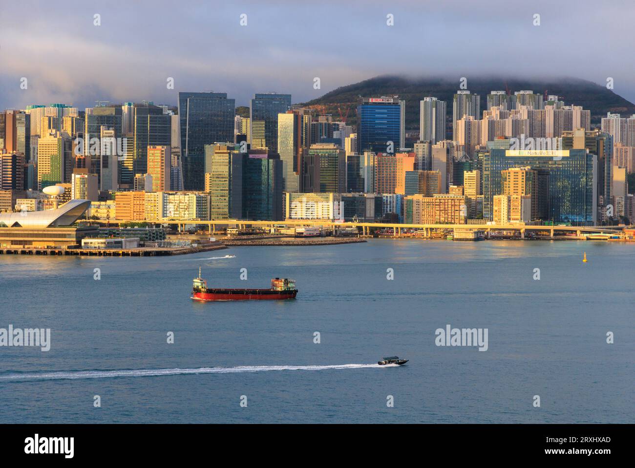Hong Kong - September 6, 2023: Tanker ship and speed boat sail by ...