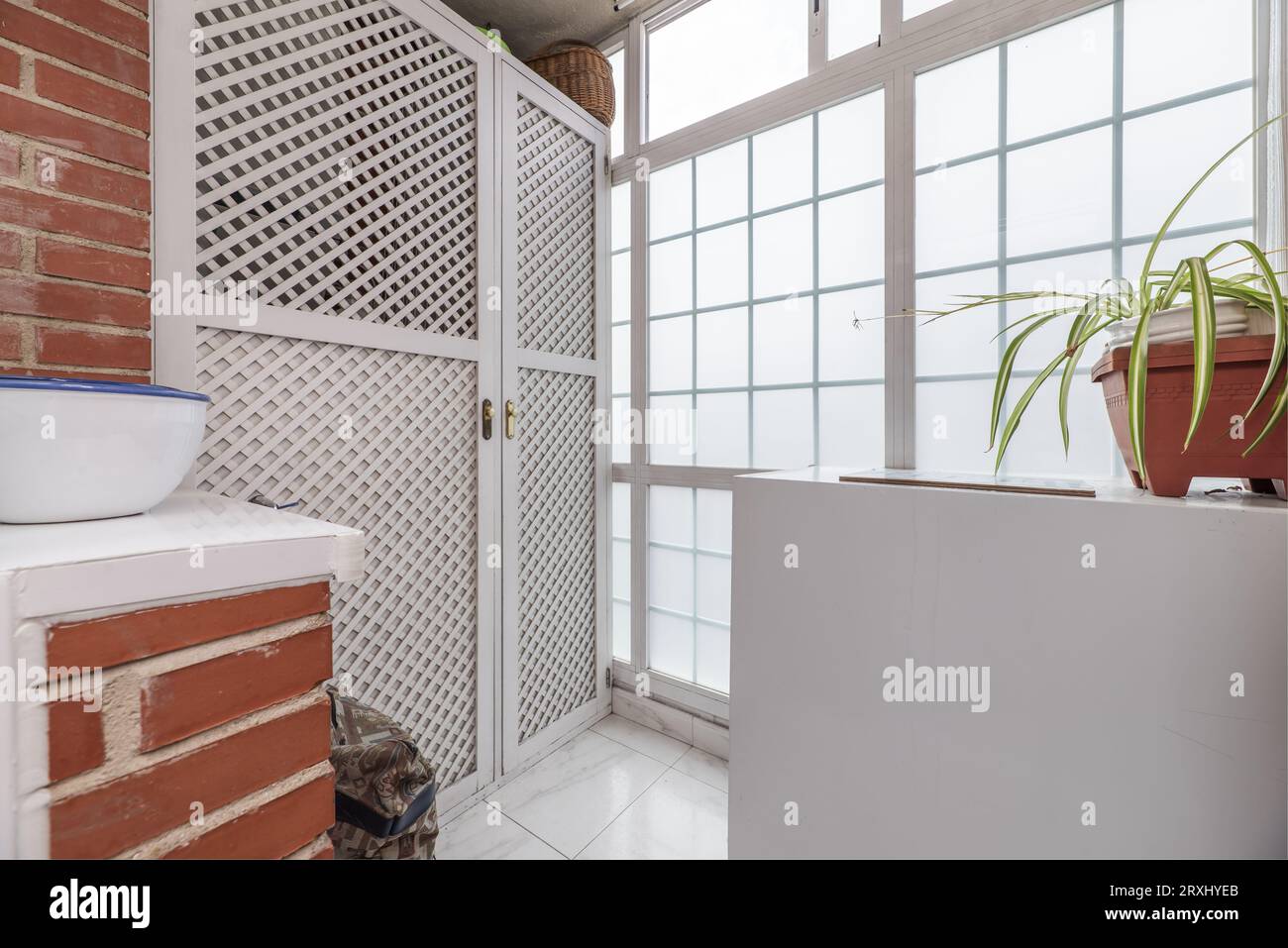 Closing terrace glazed with white aluminum and a closet with white ...