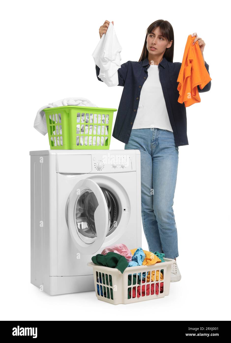 Beautiful woman with laundry near washing machine on white background Stock Photo - Alamy