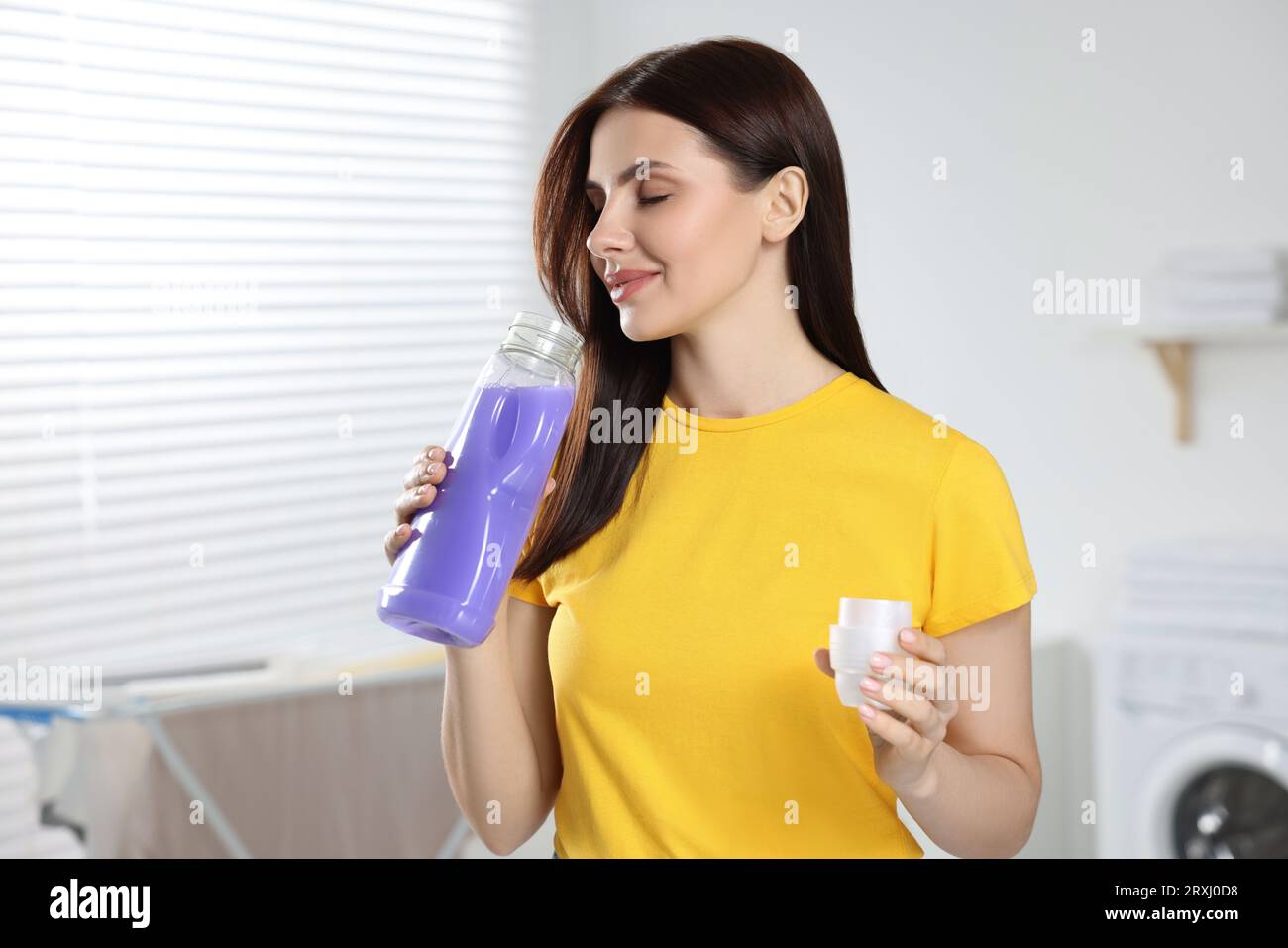 Female smelling fabric hi-res stock photography and images - Alamy