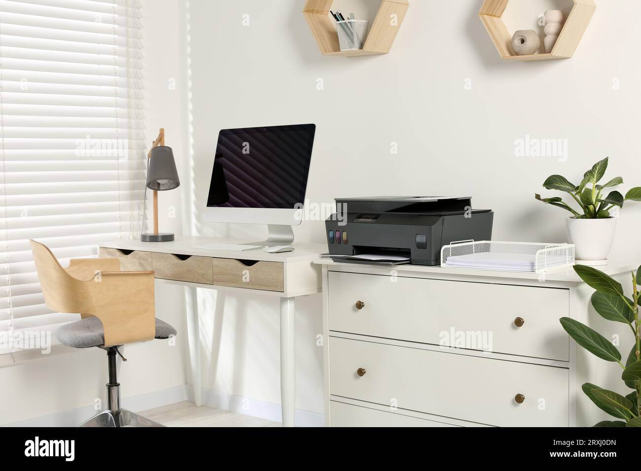 Stylish workplace with modern computer, printer and lamp Stock Photo ...