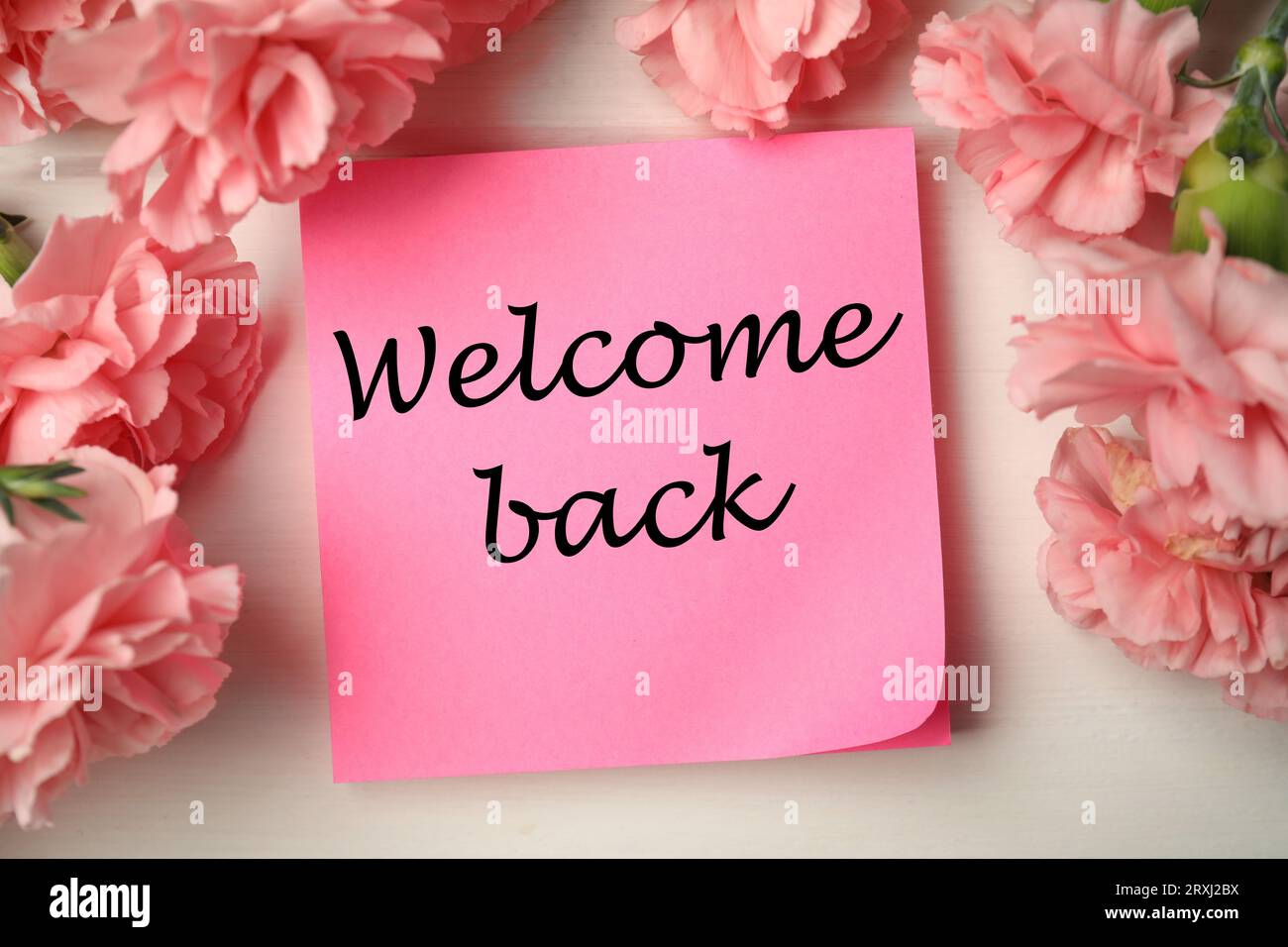 Welcome note with flowers hi-res stock photography and images - Alamy