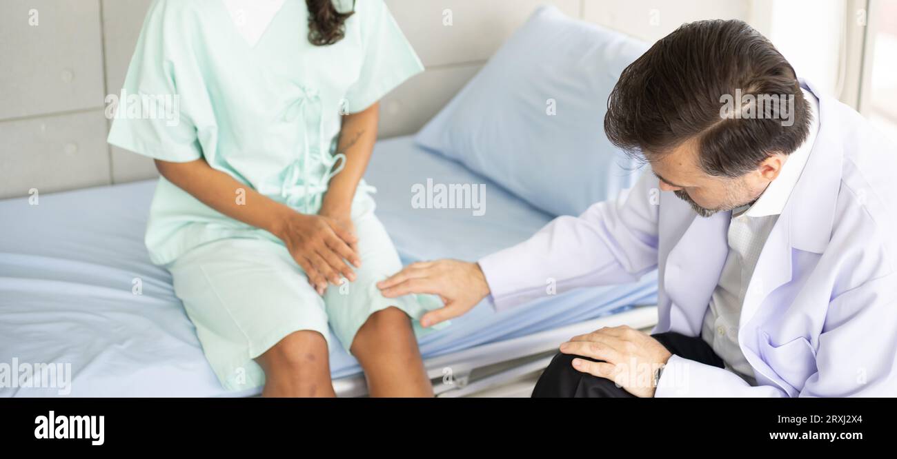 Caucasian male physician diagnosis for root cause finding with Hispanic ...