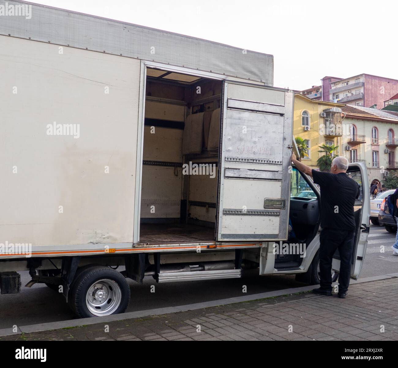 truck is ready for loading. door in the back of the truck is open ...