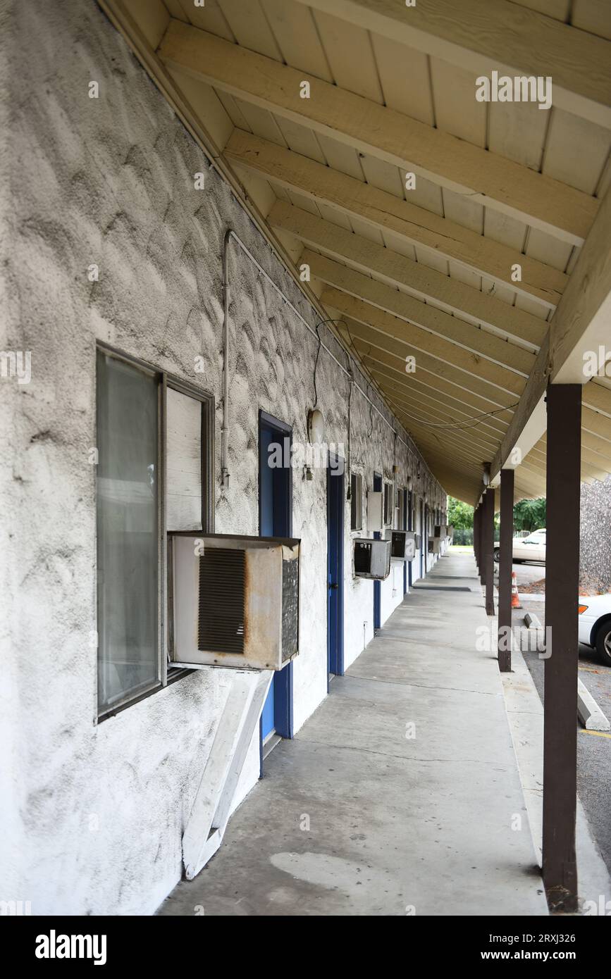 ORANGE, CALIFORNIA - 20 SEPT 2023: Corridor with room doors and window ...
