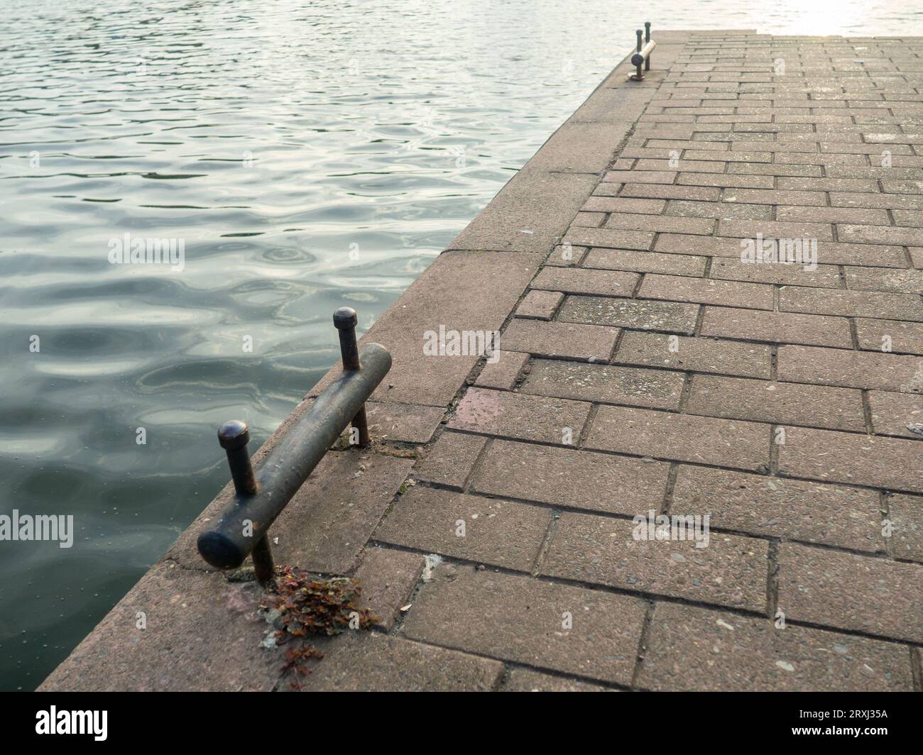 Small thin bollard. Bollard for boats. Parking for small vessels. Small ...