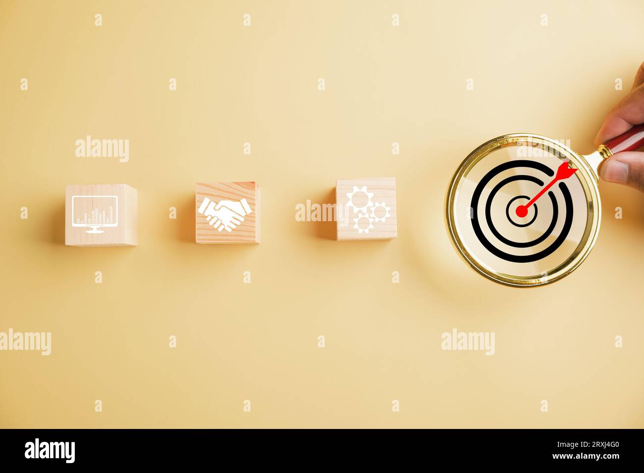 Target icon under magnifying glass Stock Photo - Alamy