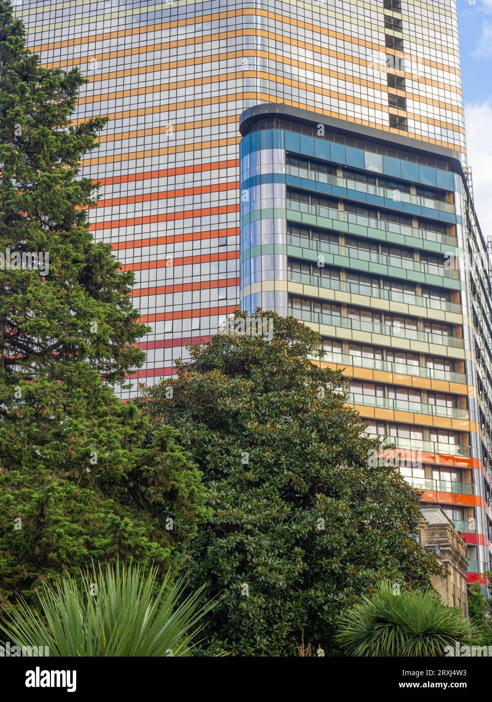 Construction of a high-rise building. Skyscraper glazing. Modern ...