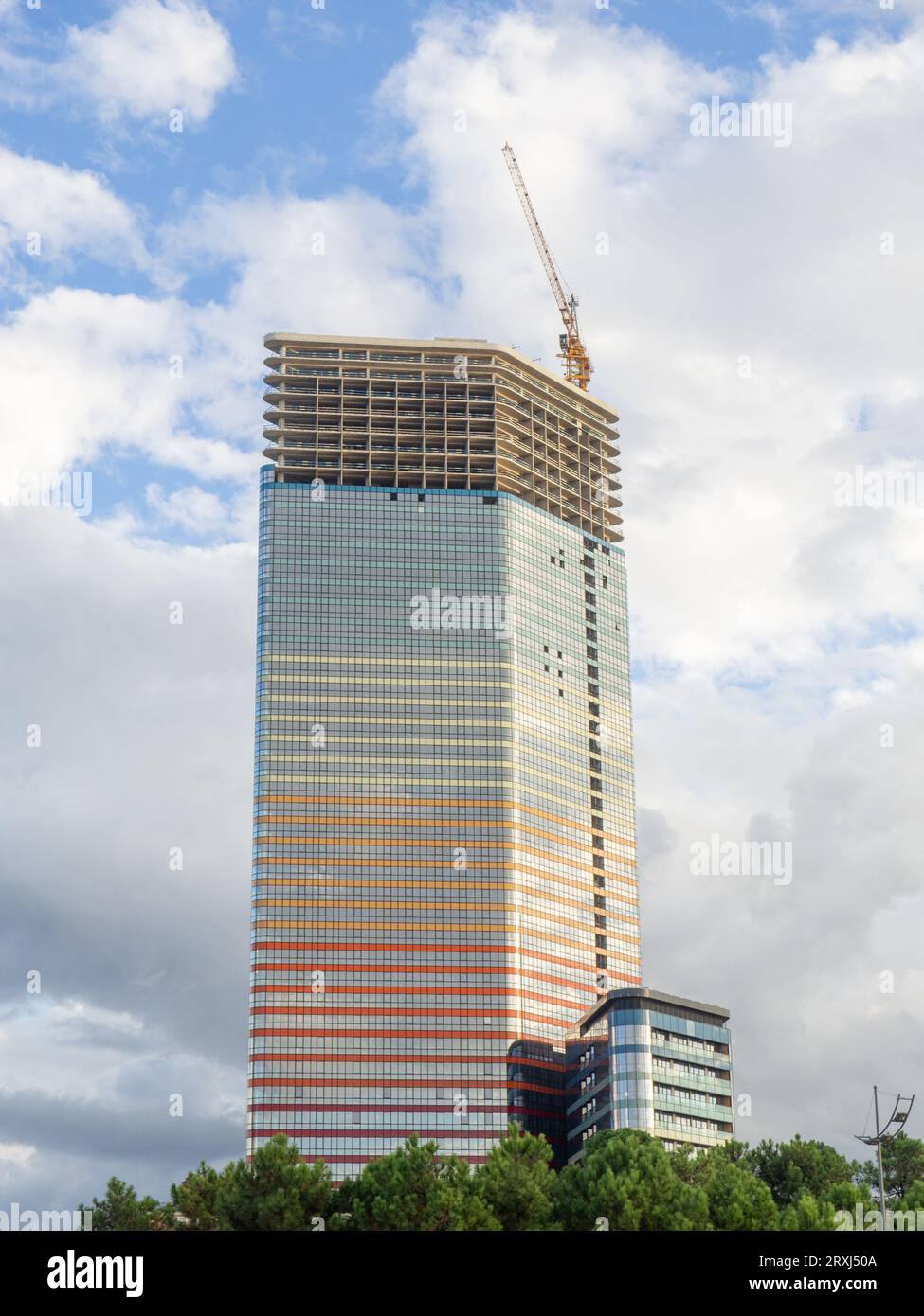 Construction of a high-rise building. Skyscraper glazing. Modern ...