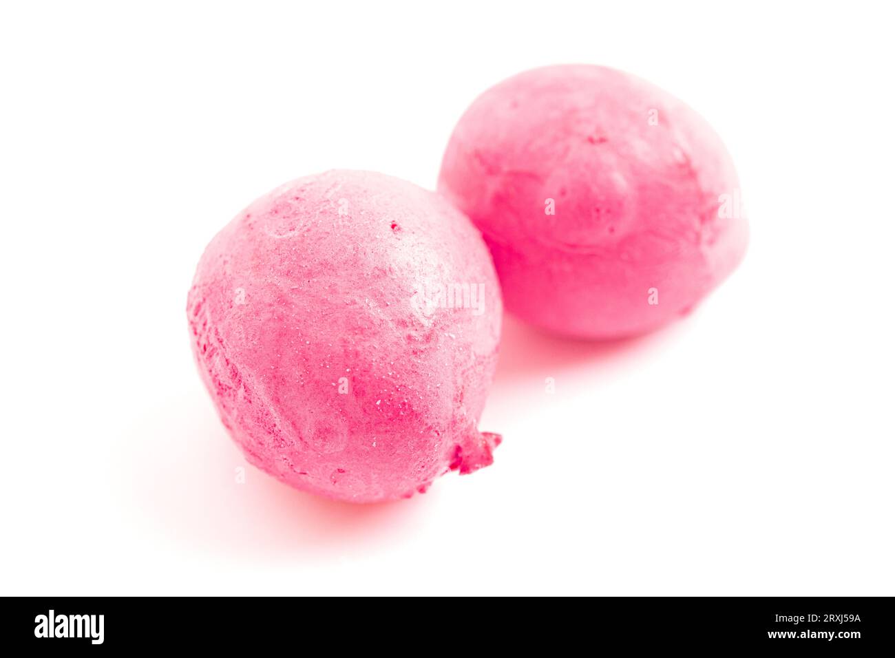 Pink Freeze Dried Saltwater Taffy on a White Background Stock Photo - Alamy