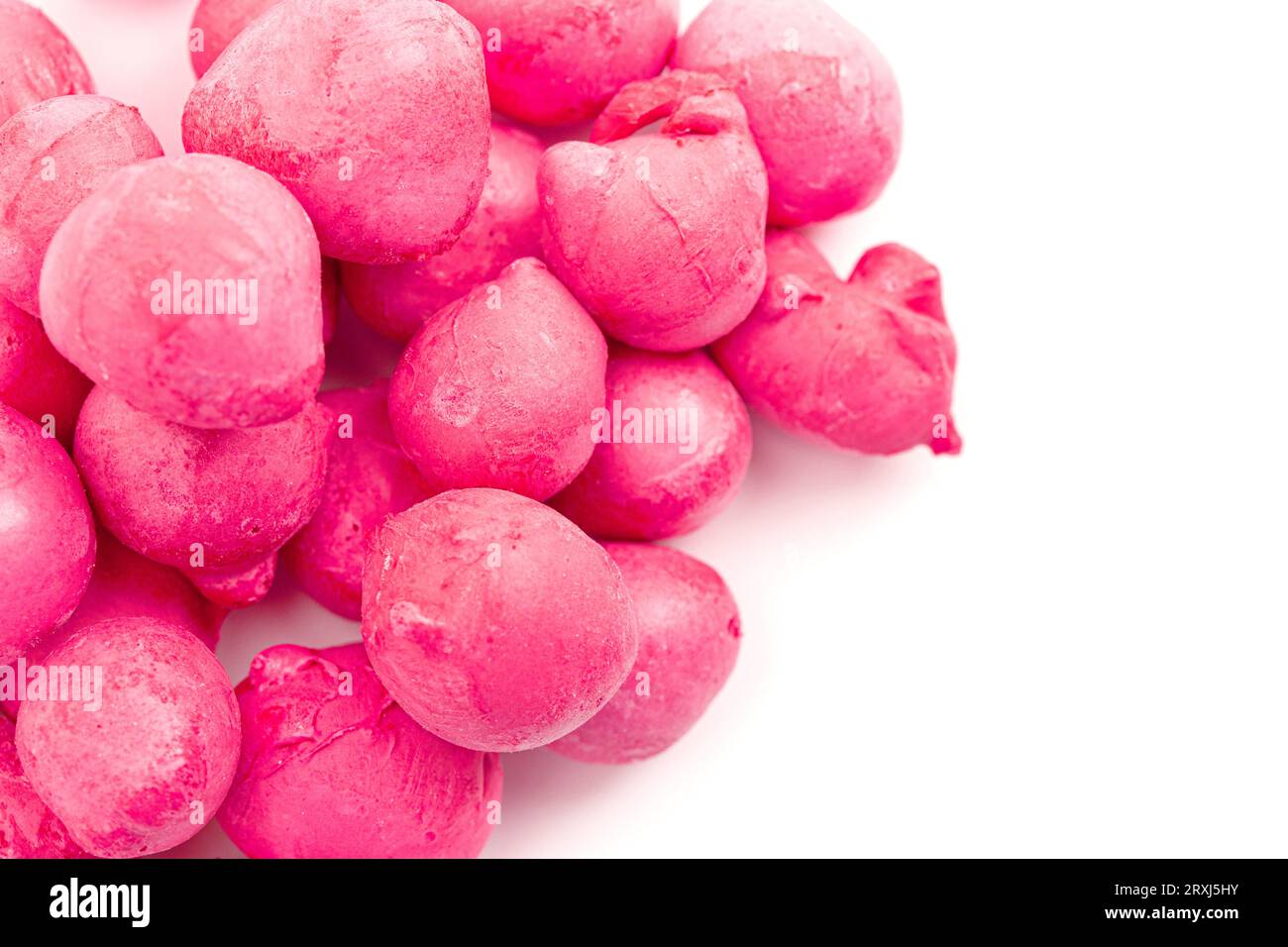 Pink Freeze Dried Saltwater Taffy on a White Background Stock Photo - Alamy