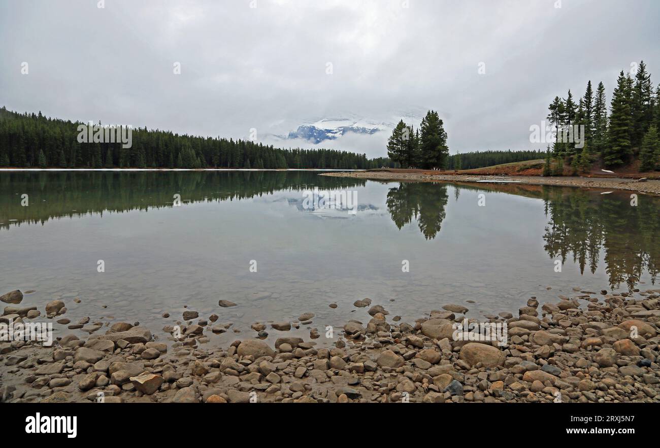 Mirror reflection in Two Jack Lake - Canada Stock Photo - Alamy