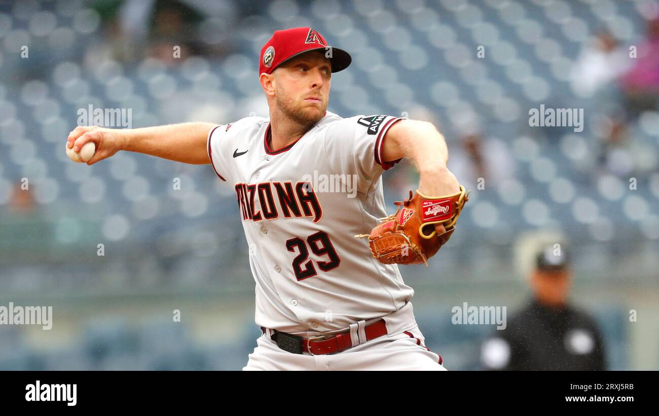 Arizona Diamondbacks starting pitcher Merrill Kelly (29) throws against ...