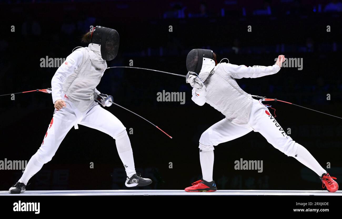 Japanese fencer Yuka Ueno (R) competes against China's Huang Qianqian ...