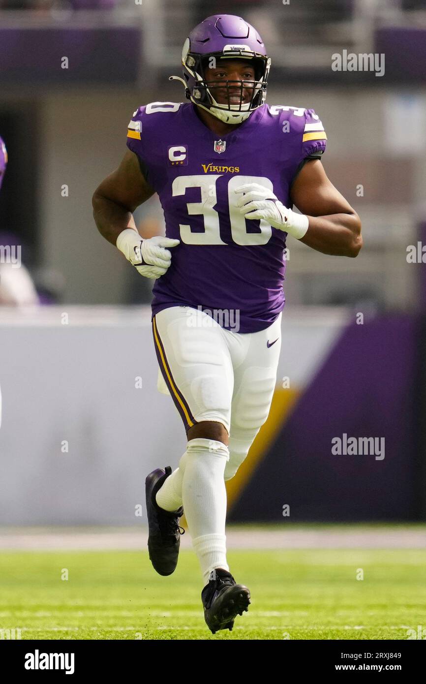 Minnesota Vikings fullback C.J. Ham (30) runs down the field during the ...
