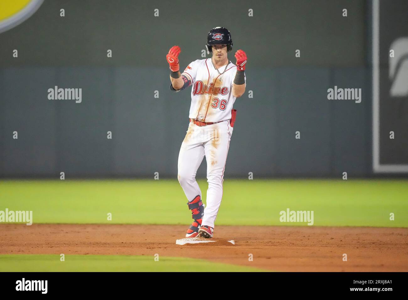 Designated hitter Nick Decker (36) of the Greenville Drive gestures ...