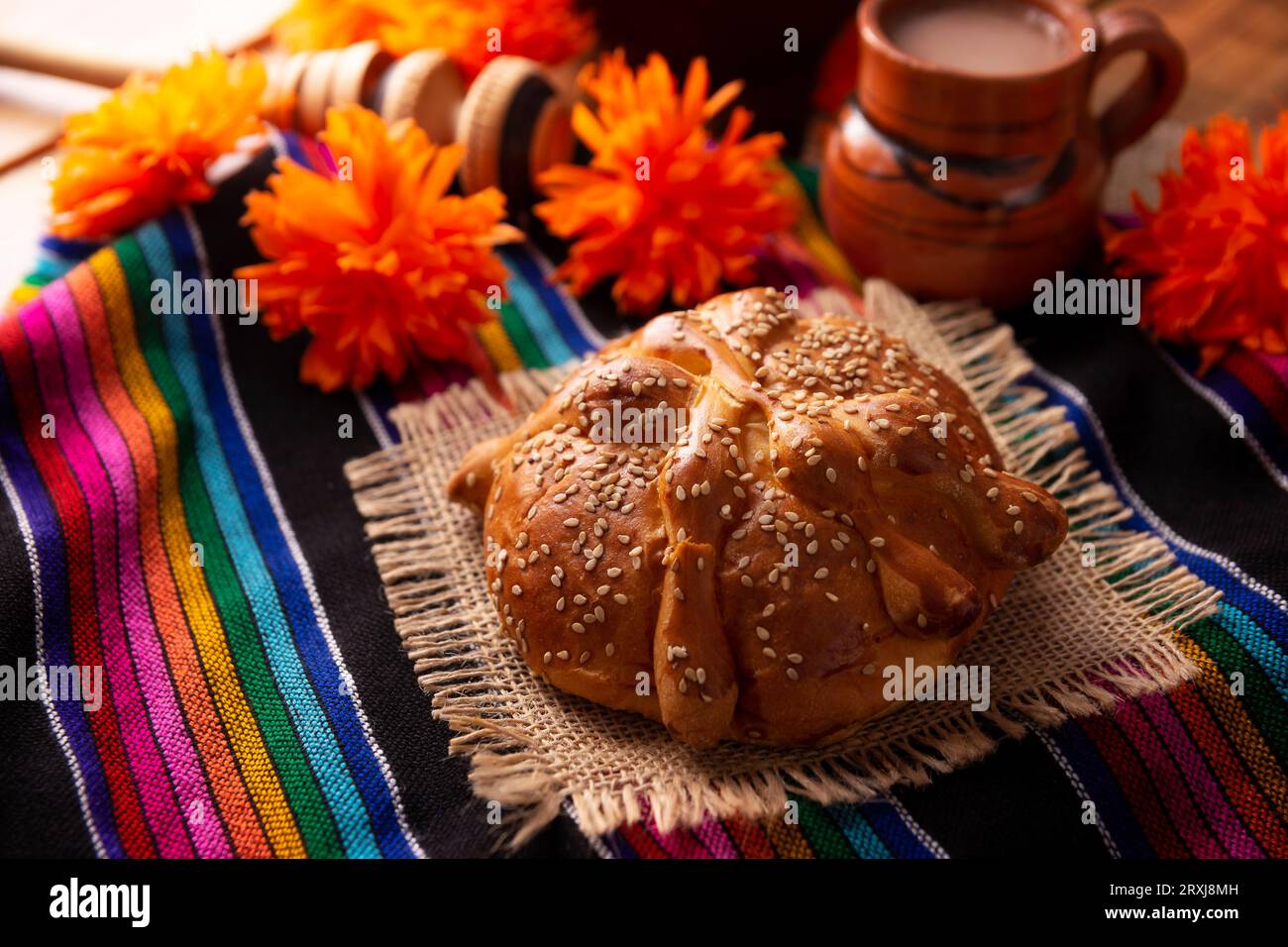 Pan de Muerto. Typical Mexican sweet bread with sesame seeds, that is ...