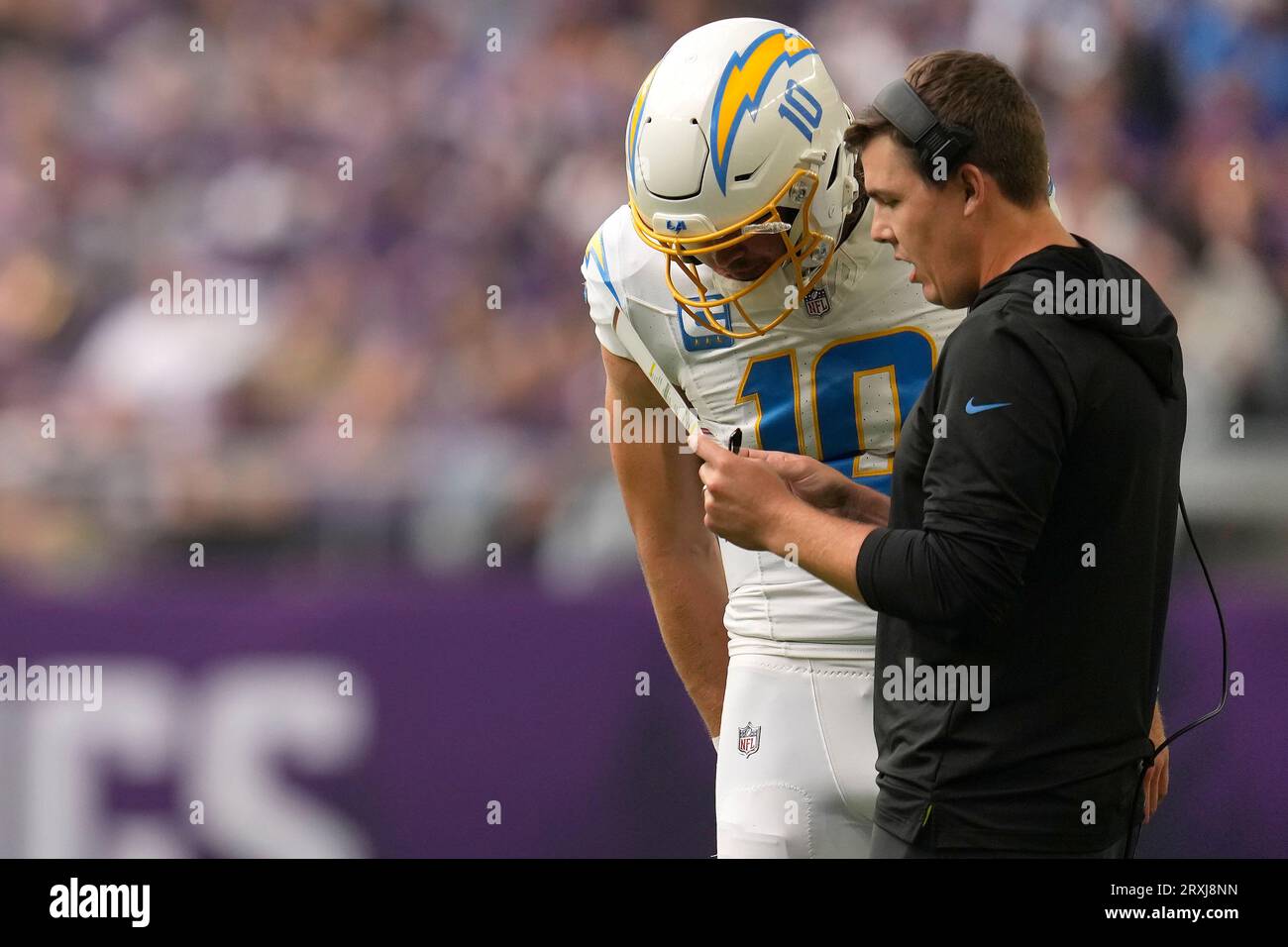 Los Angeles Chargers quarterback Justin Herbert (10) and offensive ...