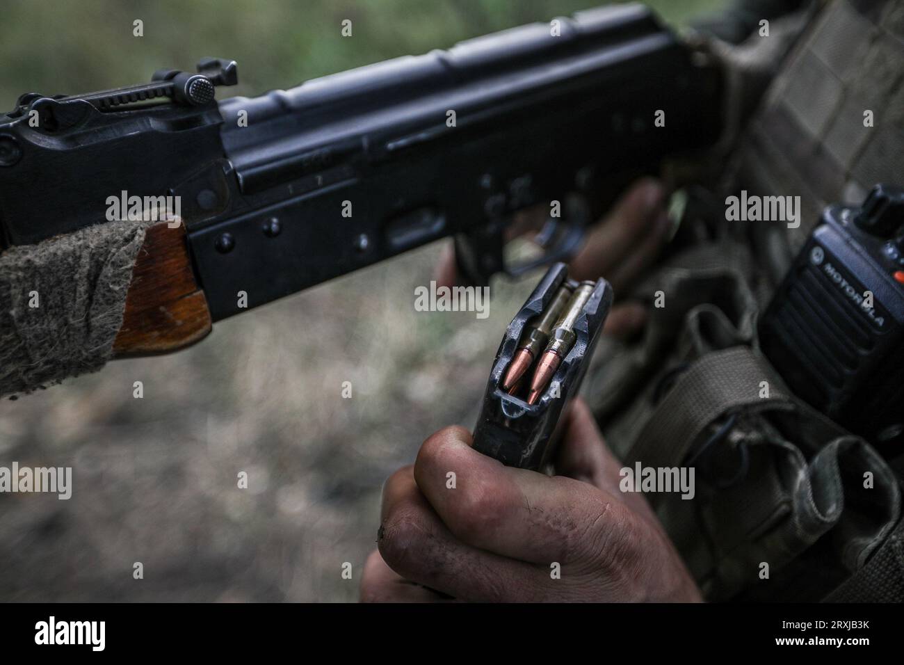 Chasiv Yar, Ukraine. 20th Sep, 2023. A Ukrainian soldier shows his AK ...