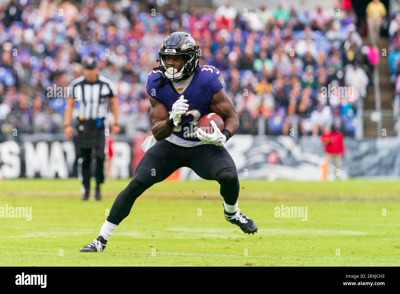 Baltimore Ravens running back Melvin Gordon III runs with the ball ...