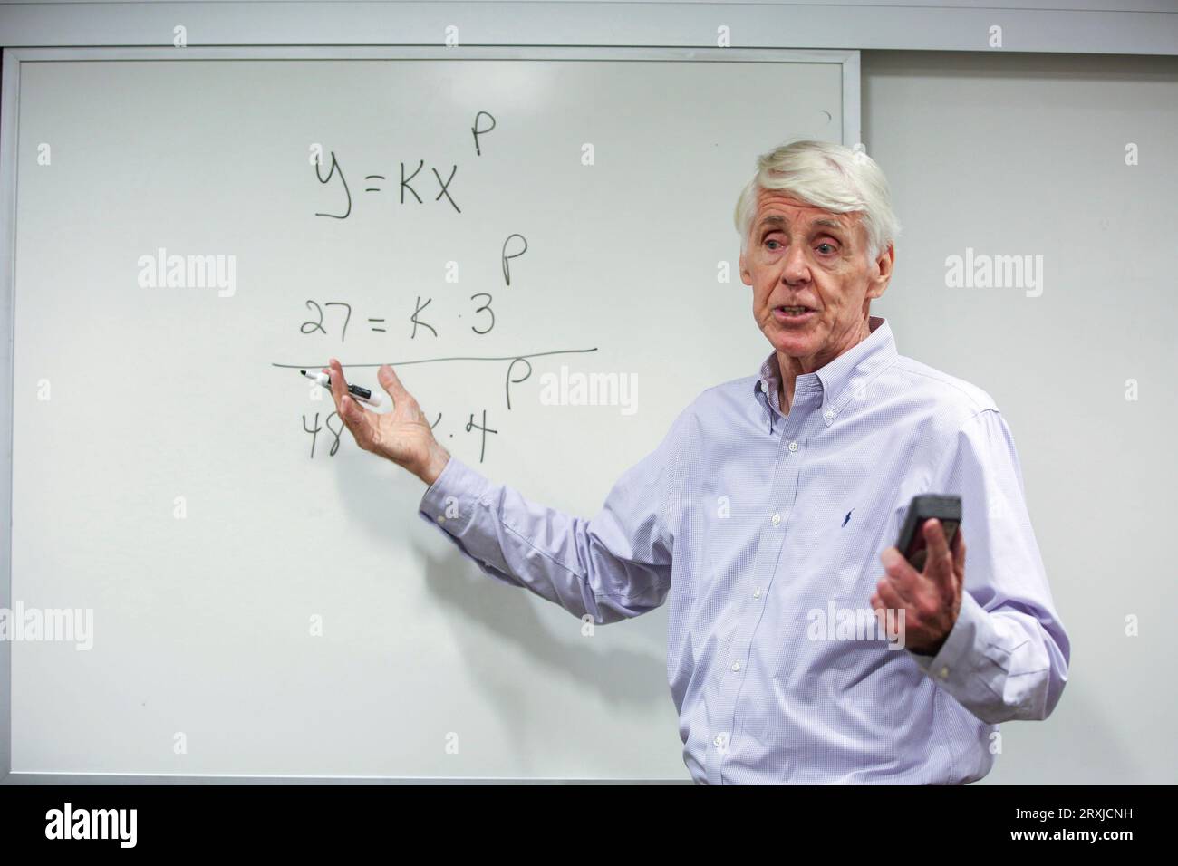 Teacher Jerry Howland explains an equation during the Bridge to ...