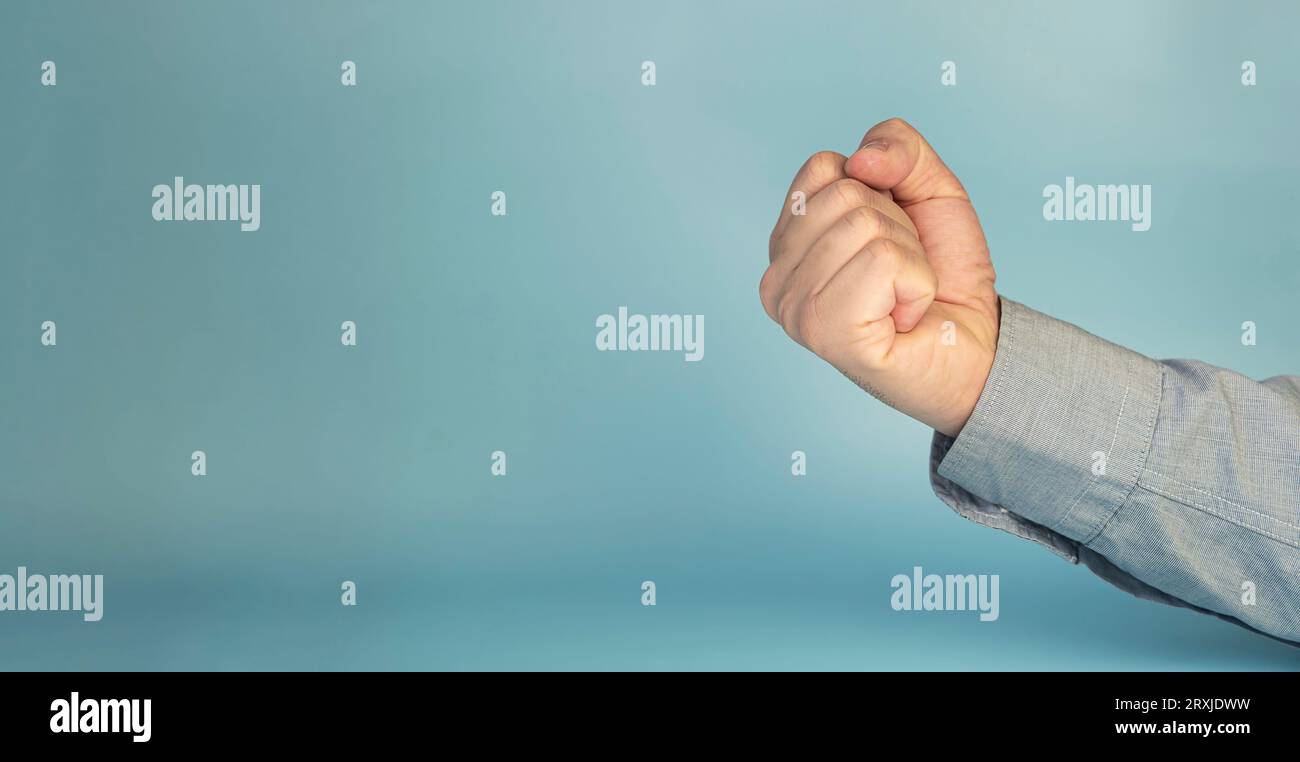 close-up on a fist . Concept showing violence, frustration, toxicity ...
