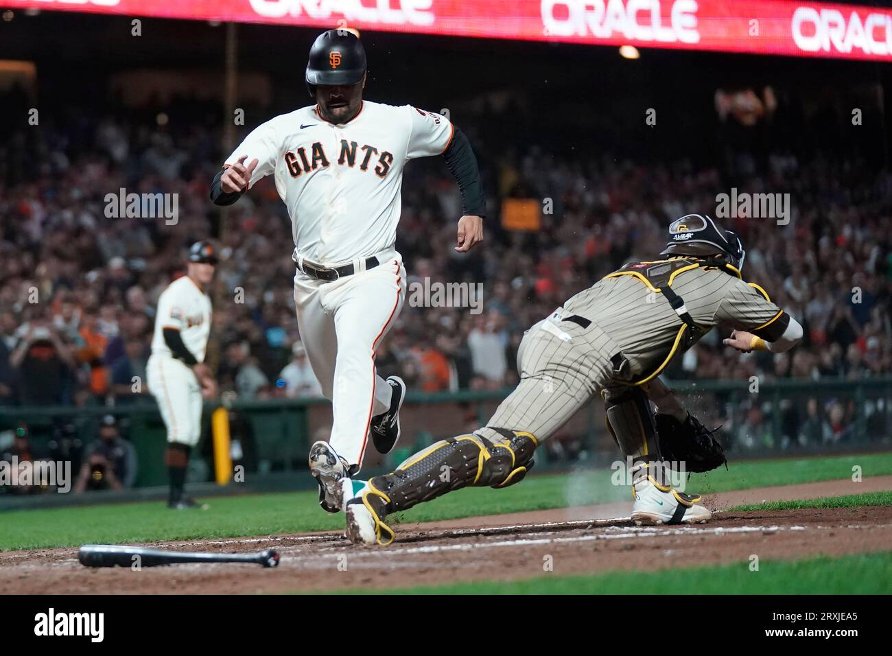 San Diego Padres catcher Brett Sullivan, right, forces San Francisco ...