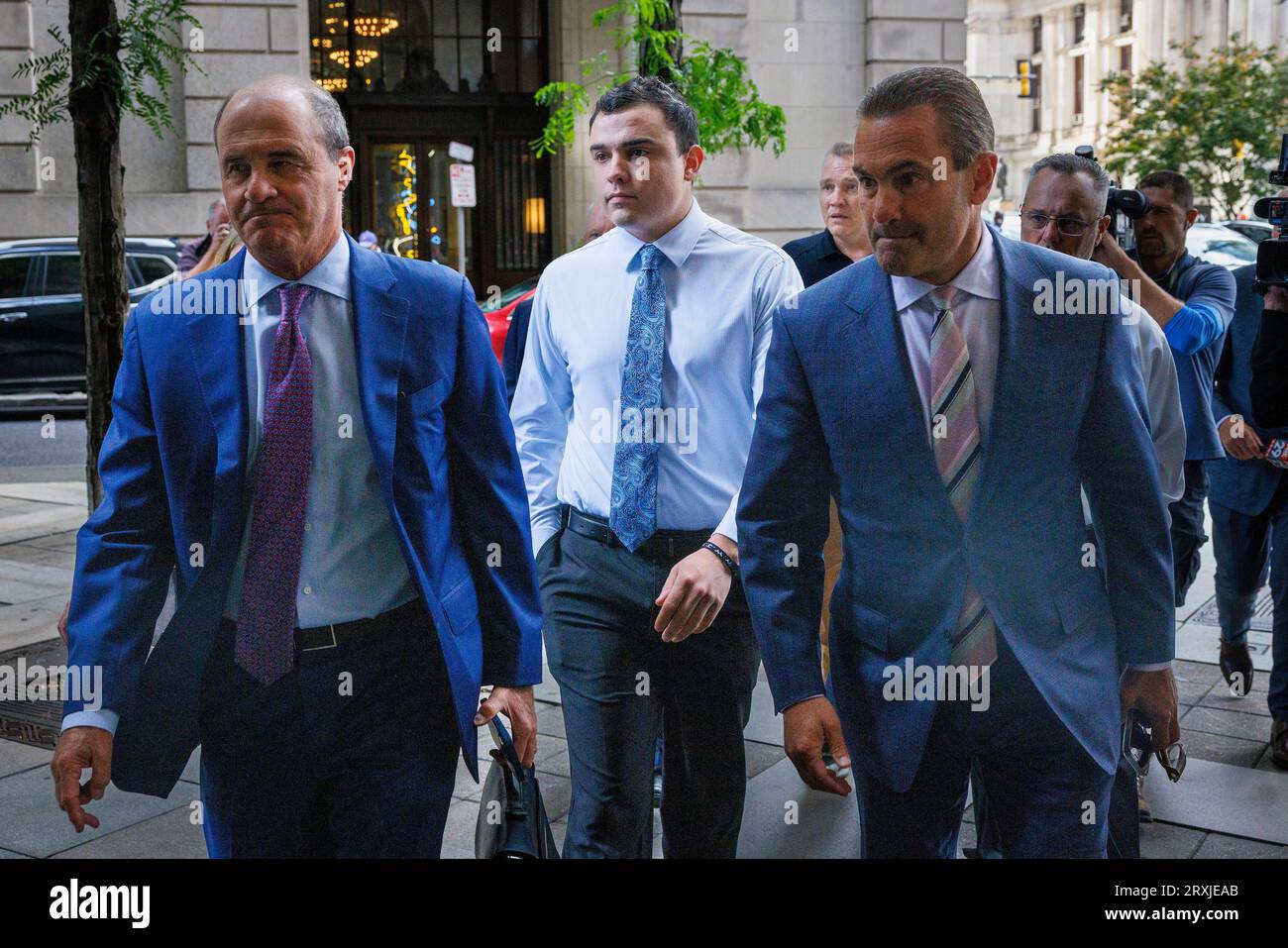 FILE - Philadelphia police Officer Mark Dial, center, arrives at the ...