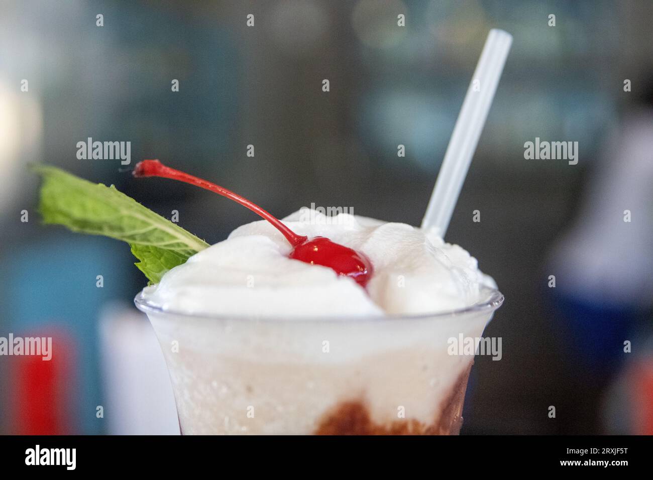 Whipped cream topping with a cherry Stock Photo - Alamy