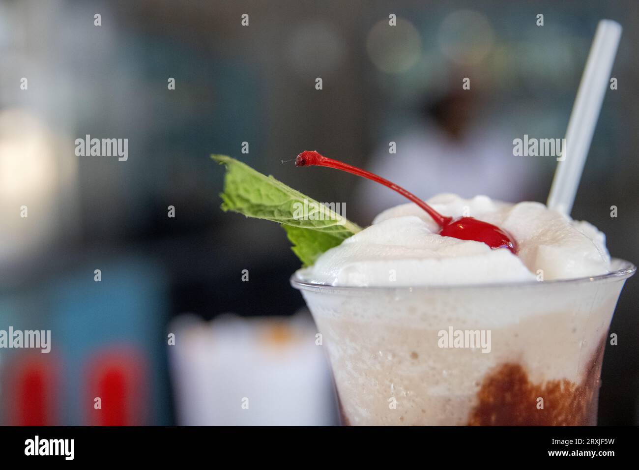 Whipped cream topping with a cherry Stock Photo - Alamy