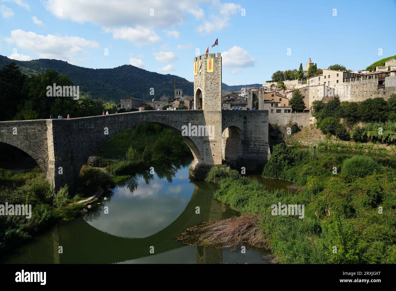 Medieval bridge over the river Fluvià in the town of Besalú, Girona ...